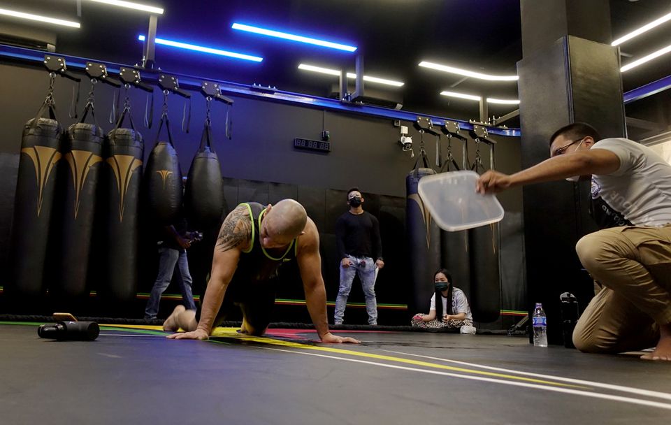 Brazilian sets burpee Guinness Record in Singapore, Singapore News ...