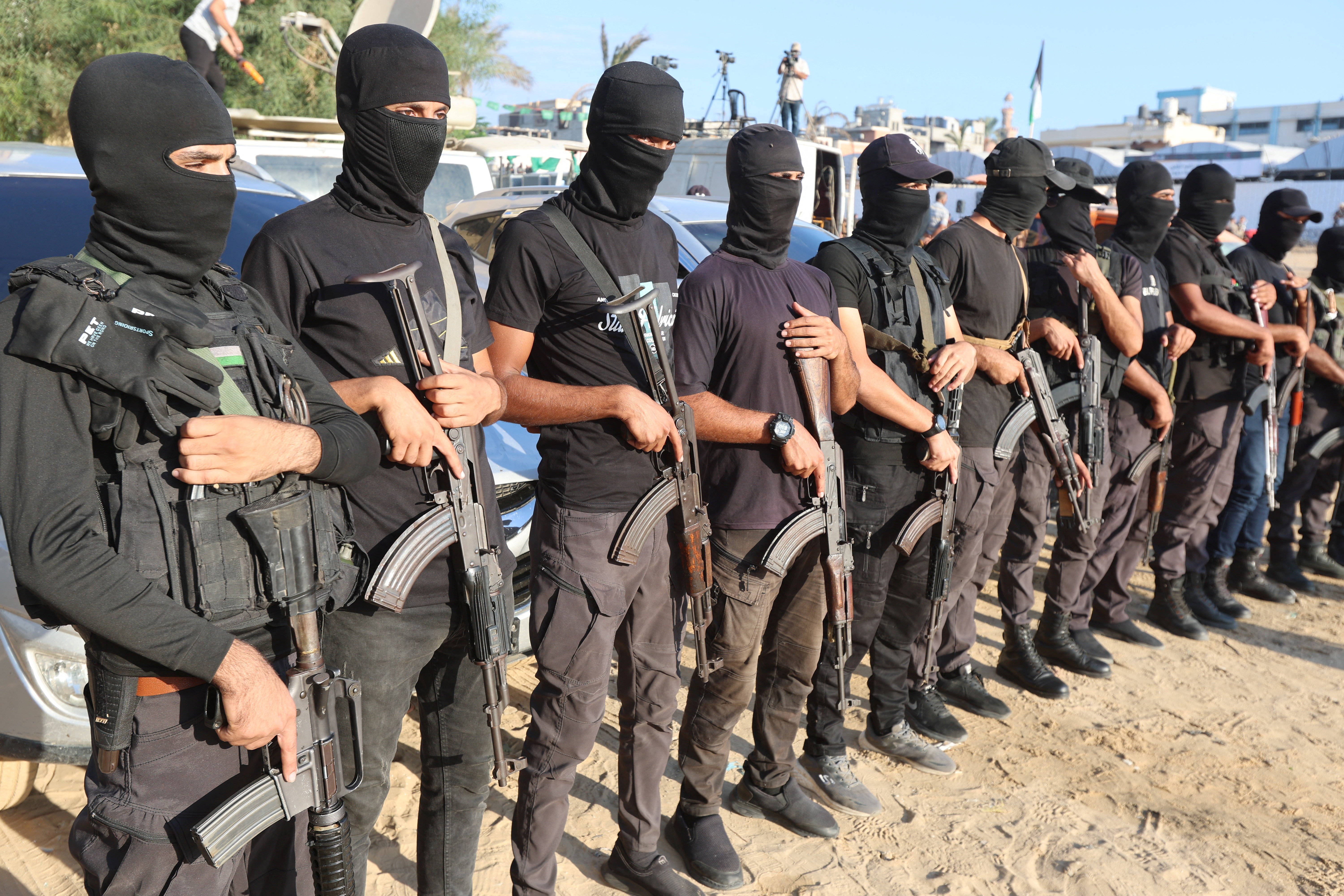 Hamas deploys fighters as hostages released, in show of strength, World ...