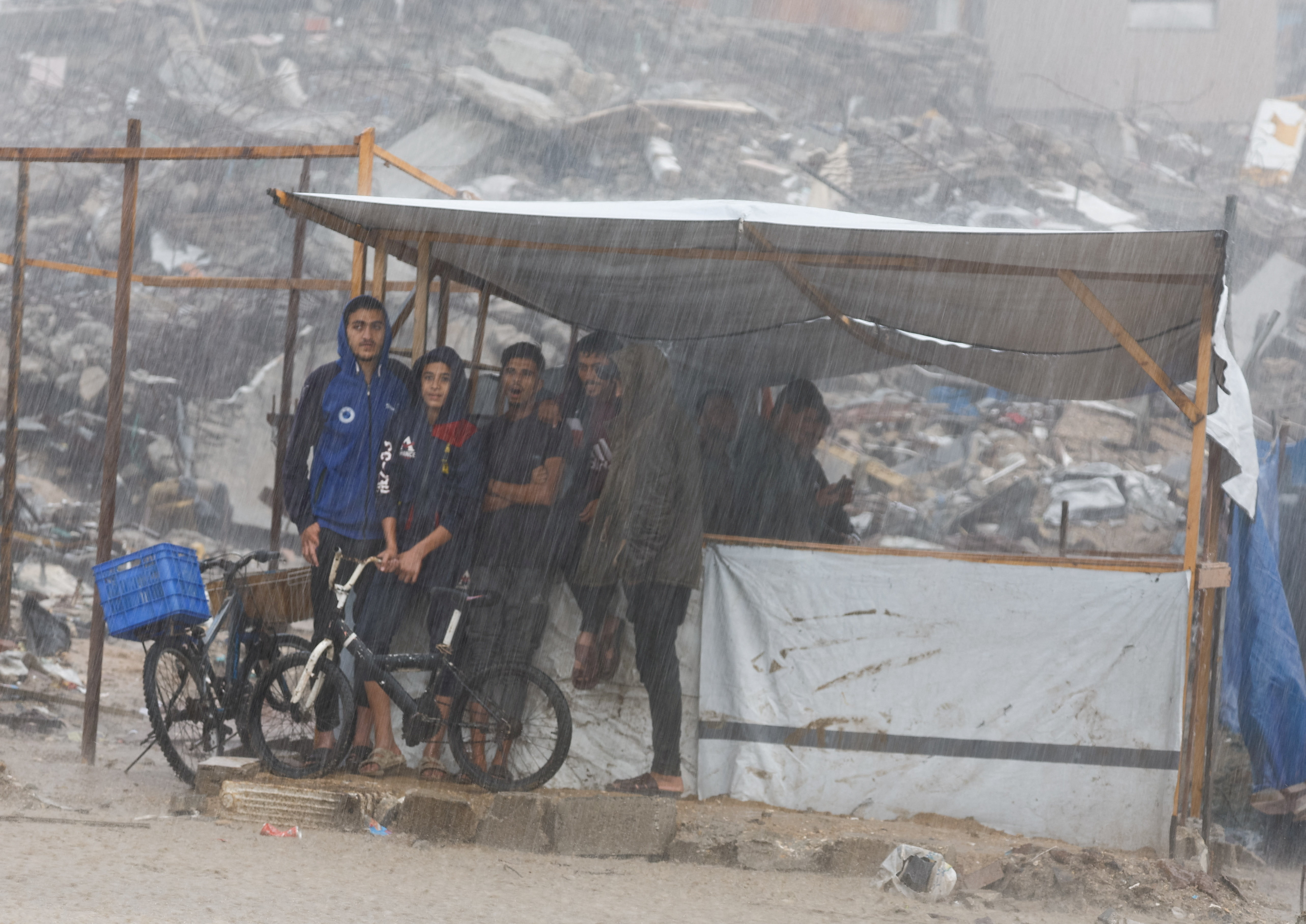 Floods swamp homeless Palestinians' tents in Gaza as winter looms ...