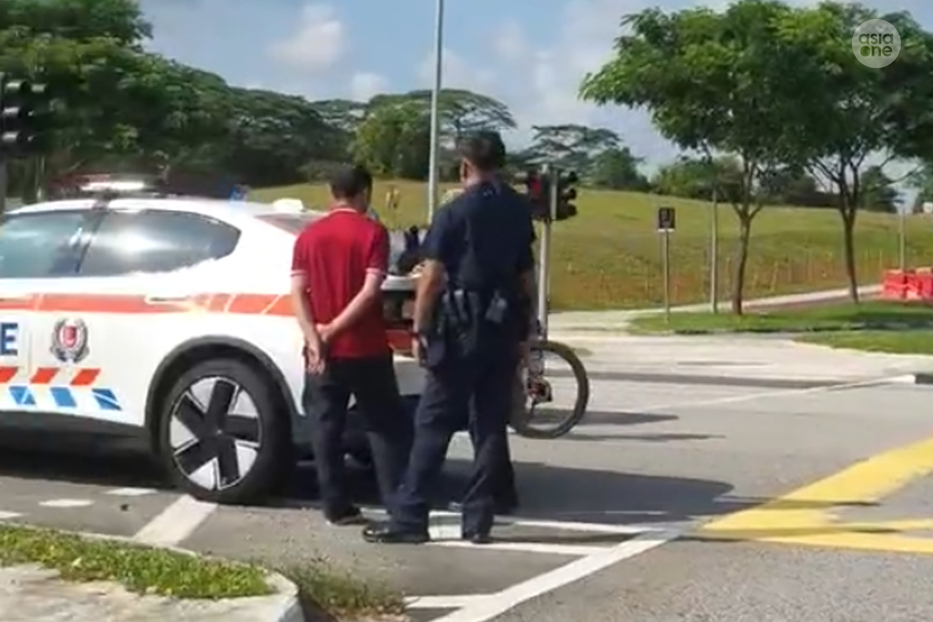 Passenger rescued from toppled Malaysia-registered lorry in Woodlands ...