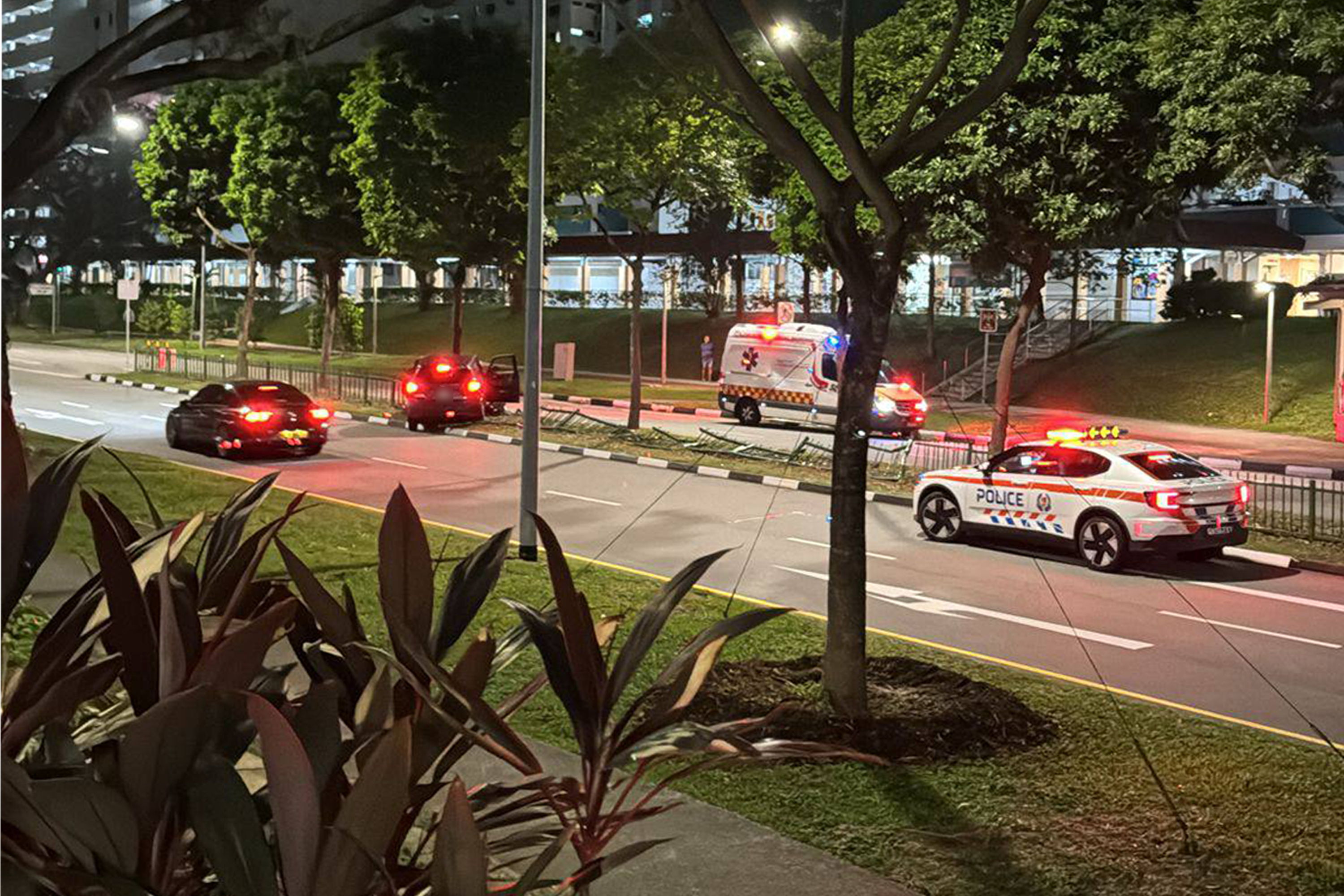 Tribecar vehicle mows down centre railings along road in Yishun ...