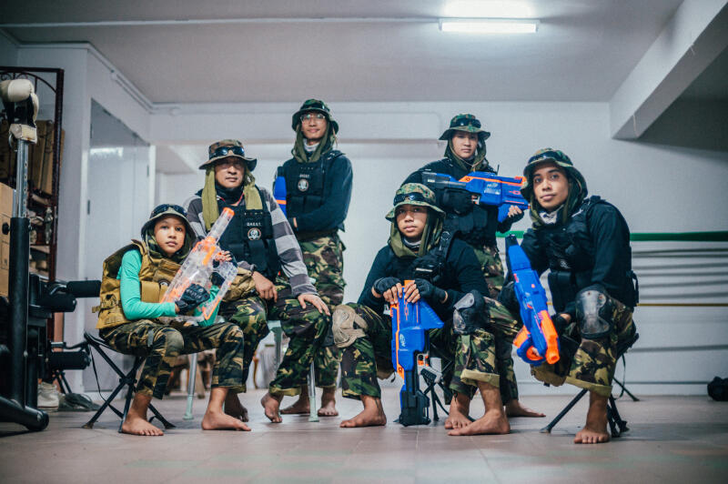 Ex-CSM leads Nerf gun play at HDB block for family bonding, Singapore ...