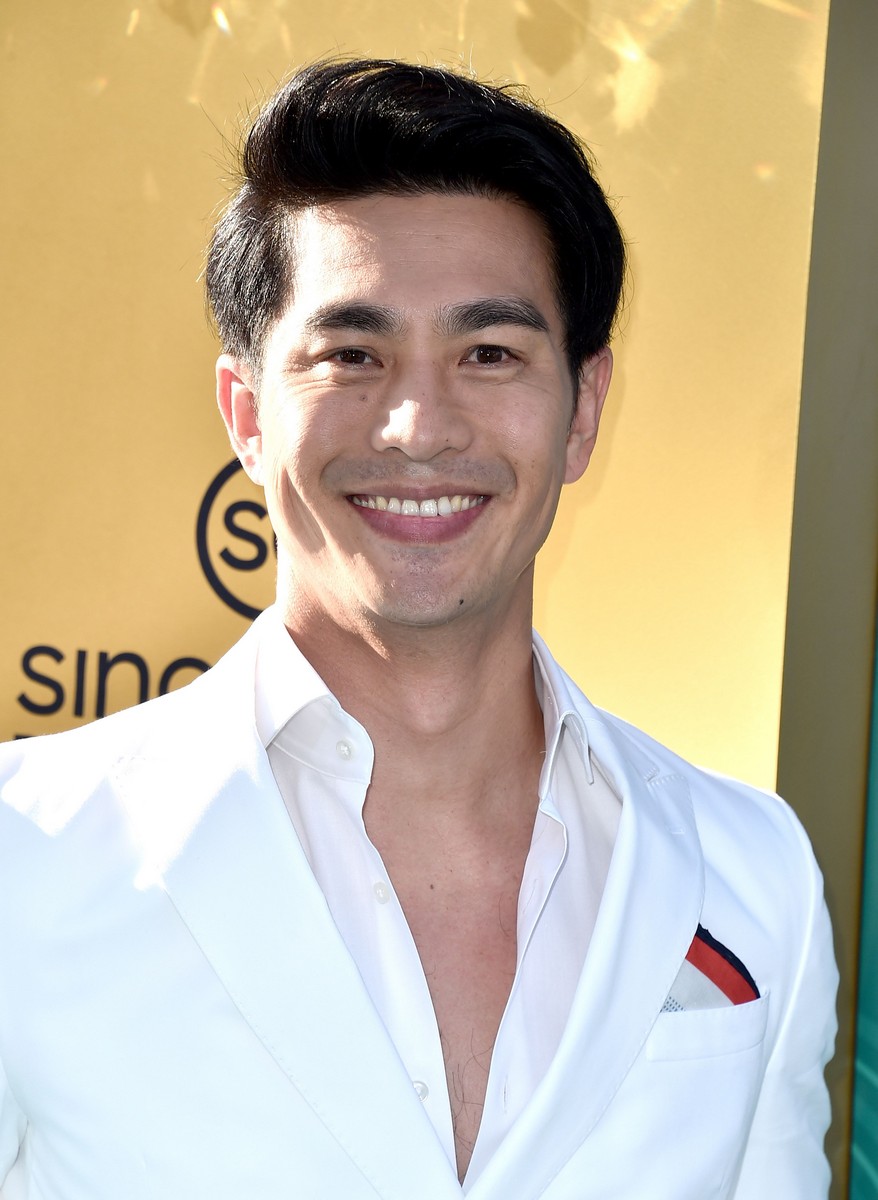 Singapore actors Fiona Xie, Pierre Png work the Crazy Rich Asians red ...