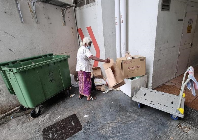 Grace Fu urges tolerance towards elderly woman hoarding cardboard ...