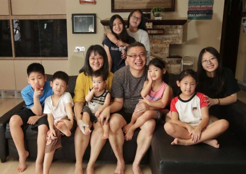 Under one roof: This couple feeds 8 kids with $300 a week, Singapore ...
