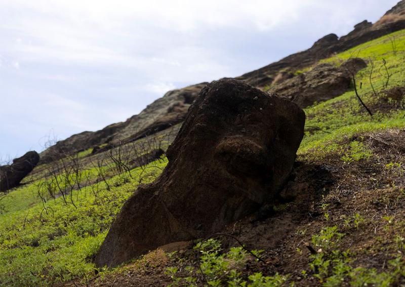 On Easter Island, burnt Moai statues are a symbol of growing tensions ...
