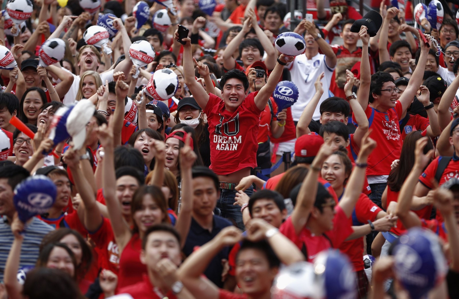 Football fans adopt innovative ways to keep awake at work, News - AsiaOne