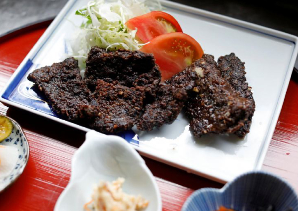 Raw, fried or on a bun: Japan's whale meat proponents reassured by ...