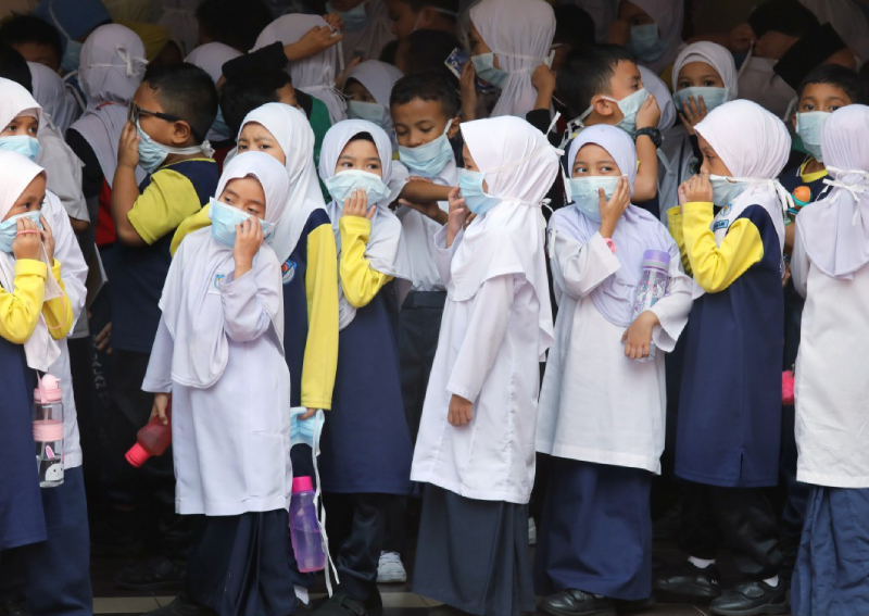 Masks in luggage: How a Malaysian tech firm reopened its China factory ...