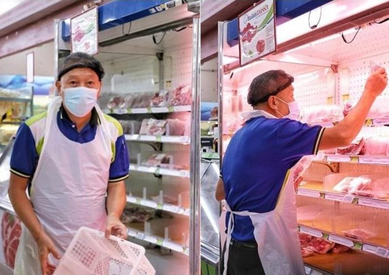 Sheng Siong CEO seen cutting and packaging meat at Tanglin Halt outlet ...