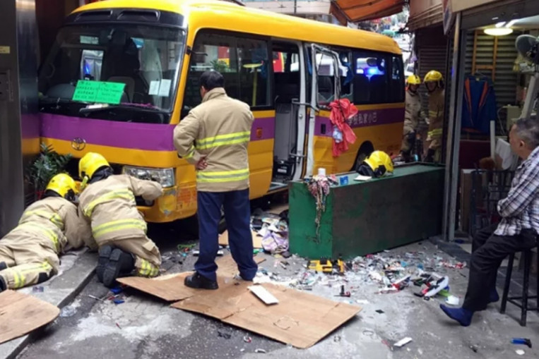 2 dead after runaway school bus mounts pavement in Hong Kong, Asia News ...